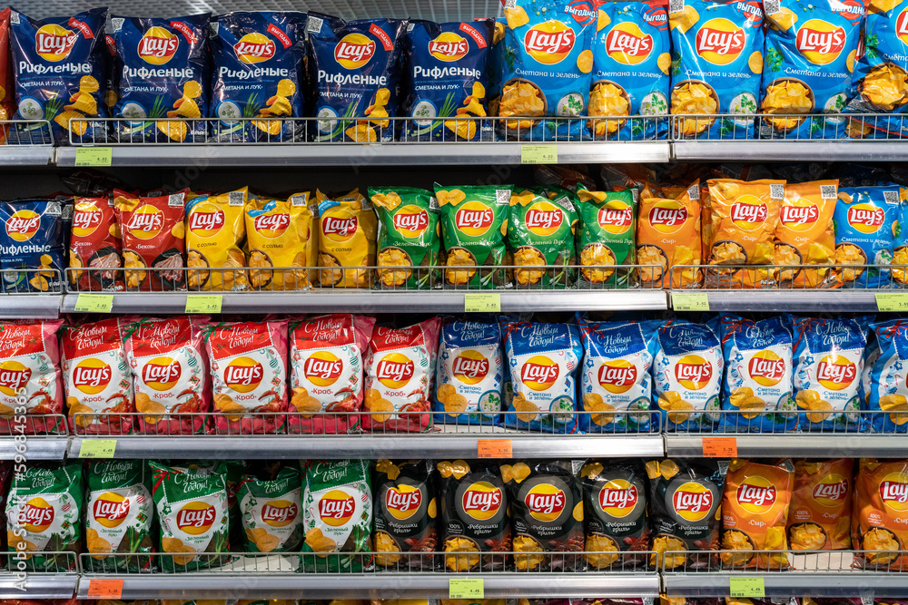 Various choice flavoured of lay's potato chips for sale in grocery ...