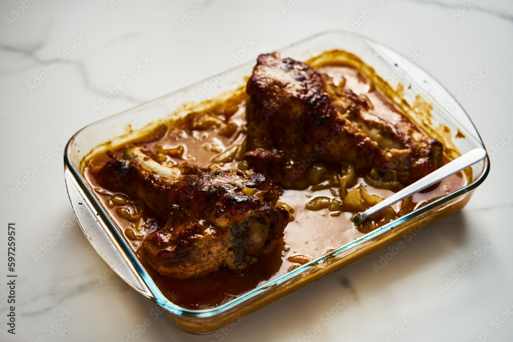 Smothered or stewed Turkey wings in a rectangular baking dish. Roasted ...