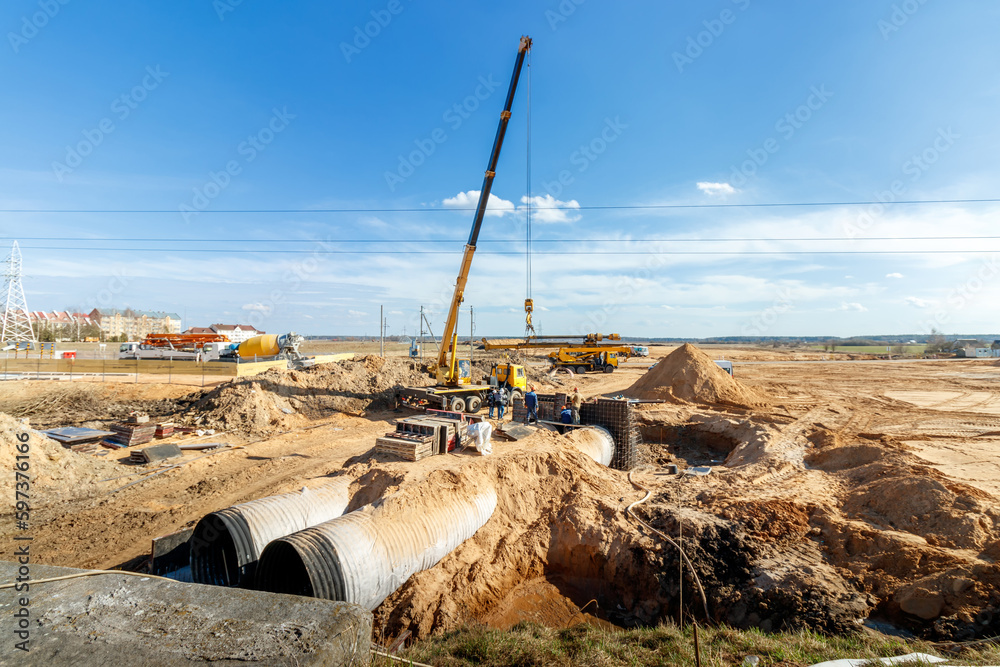 Connecting a trench drain to a concrete manhole structure at ...