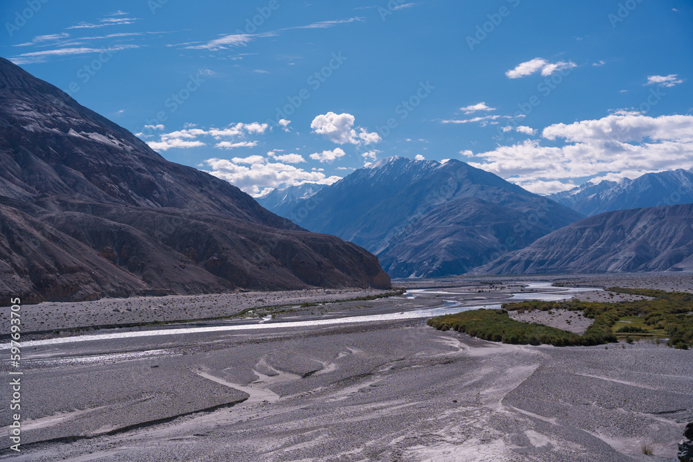 beautiful scenery, the river flows between the foothills of the ...