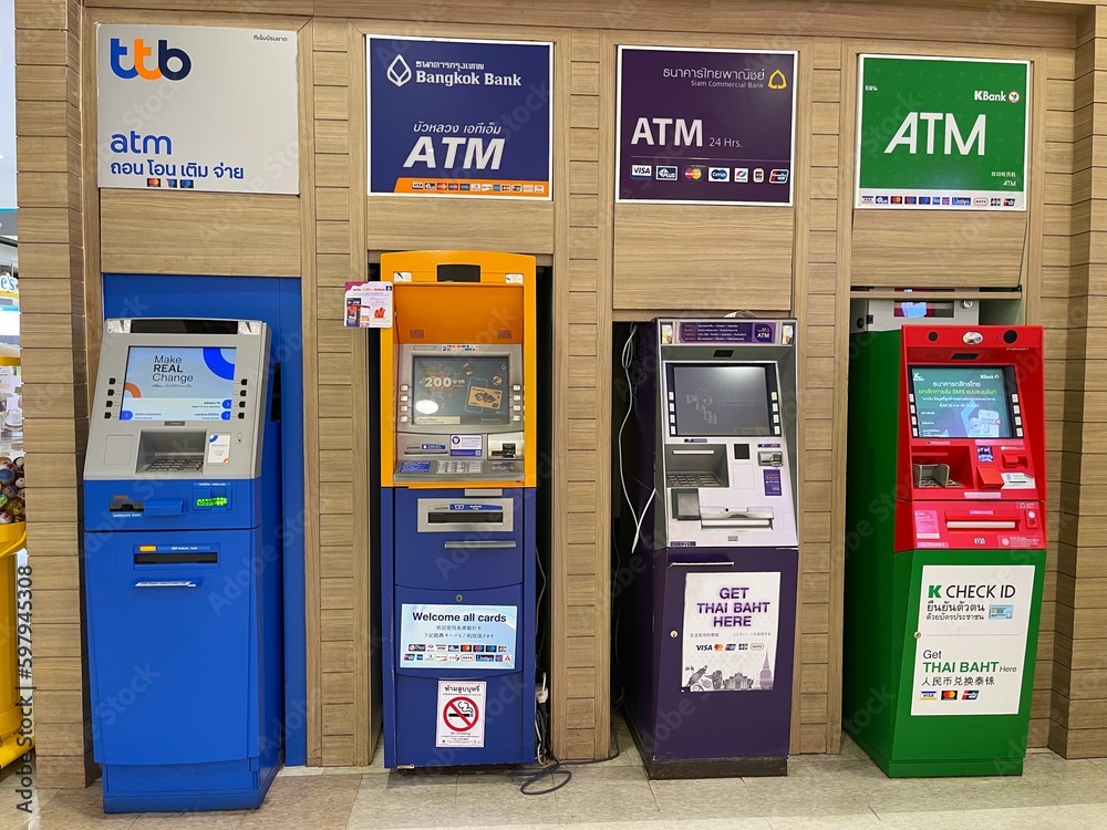ATMs of Thai banks in shopping mall. TMBThanachart (ttb), Siam Commercial Bank (SCB), Bangkok ...