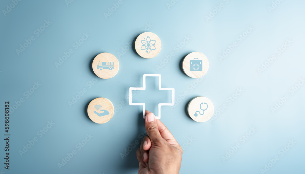 Health insurance and medical welfare concept. people hands holding plus ...