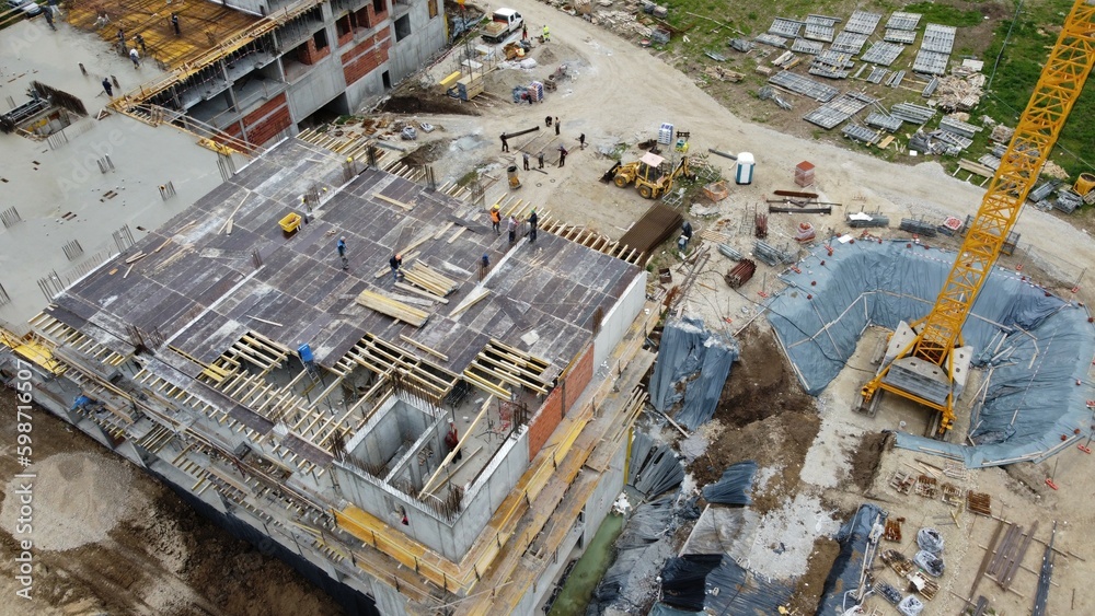 Aerial view of residential and commercial construction site, concrete ...