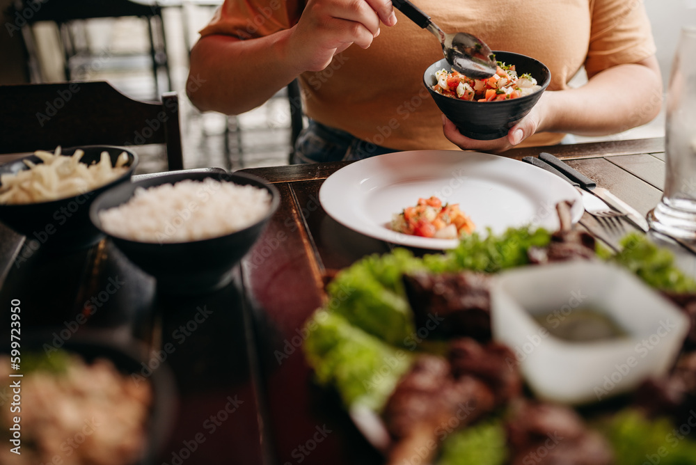 Churrasco - Barbecue Rodizio - Serving vinaigrette, rice, farofa and ...