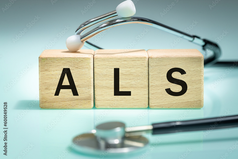 ALS or Written on wooden blocks, Amyotrophic lateral sclerosis, a rare ...