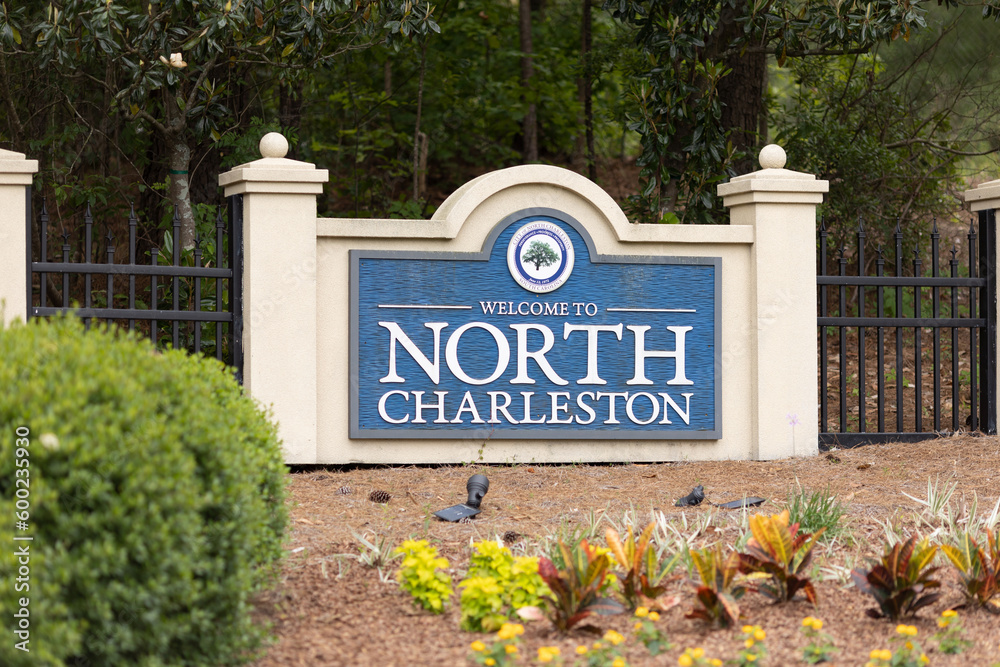 North Charleston, South Carolina city limits welcome sign with trees ...