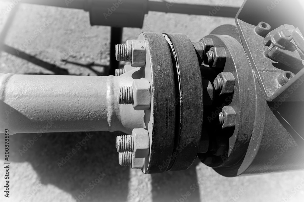 Main gas pipeline, flanged bolted connection in the frame, black and ...