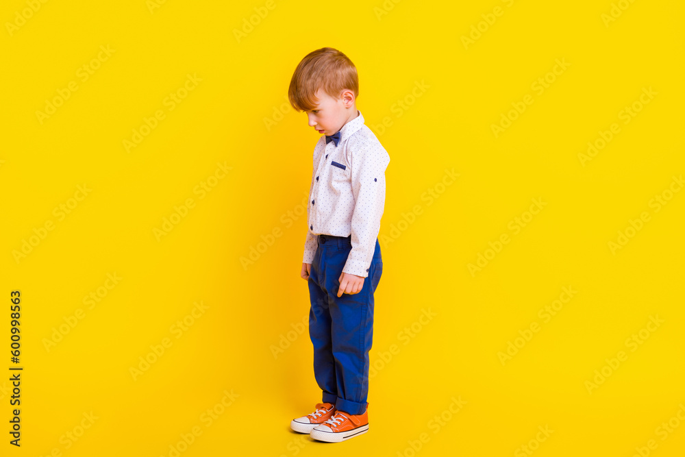 Profile side full body photo of disappointed abuse kid standing guilty ...