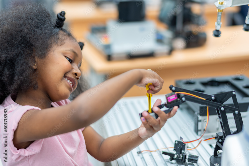 Boy male teen child concentrate enjoy Machine Learning Robot is Moving ...