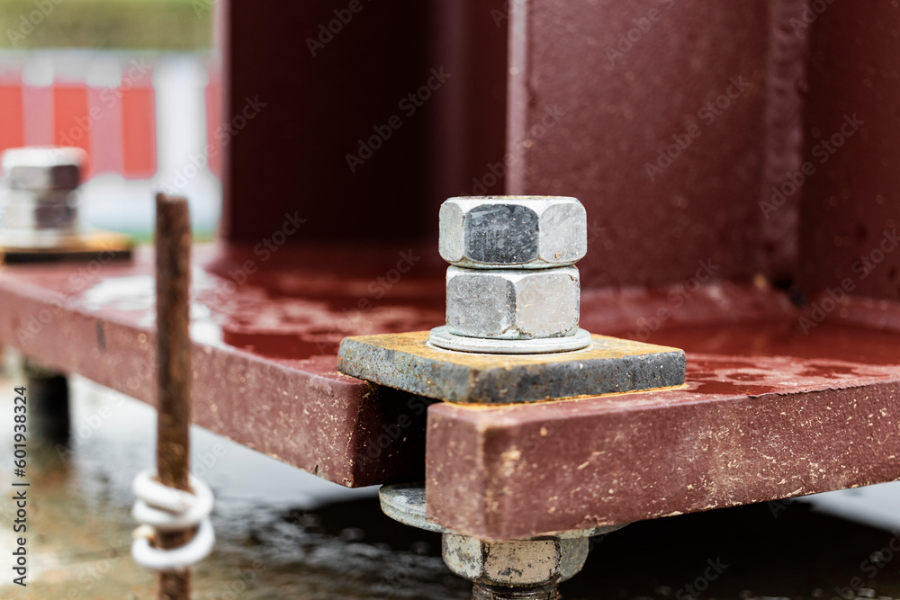 Installation of a metal column for an industrial building. Mounting ...