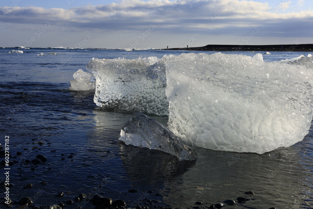 View of an iceberg on the beach of Breiðamerkursandur which is a ...