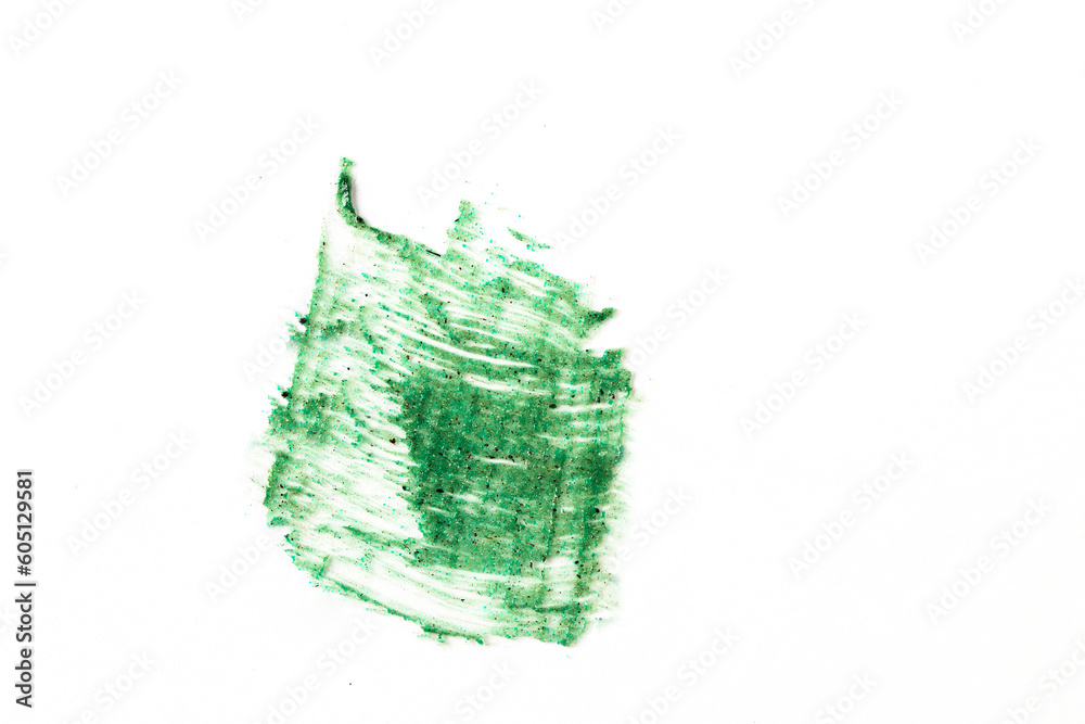 Top view of green scrub smear with microcapsules on white backgroun for ...