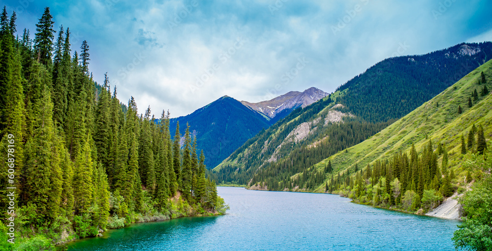 Lake Kaindy sunken forest in Kazakhstan. Beautiful mountain nature ...