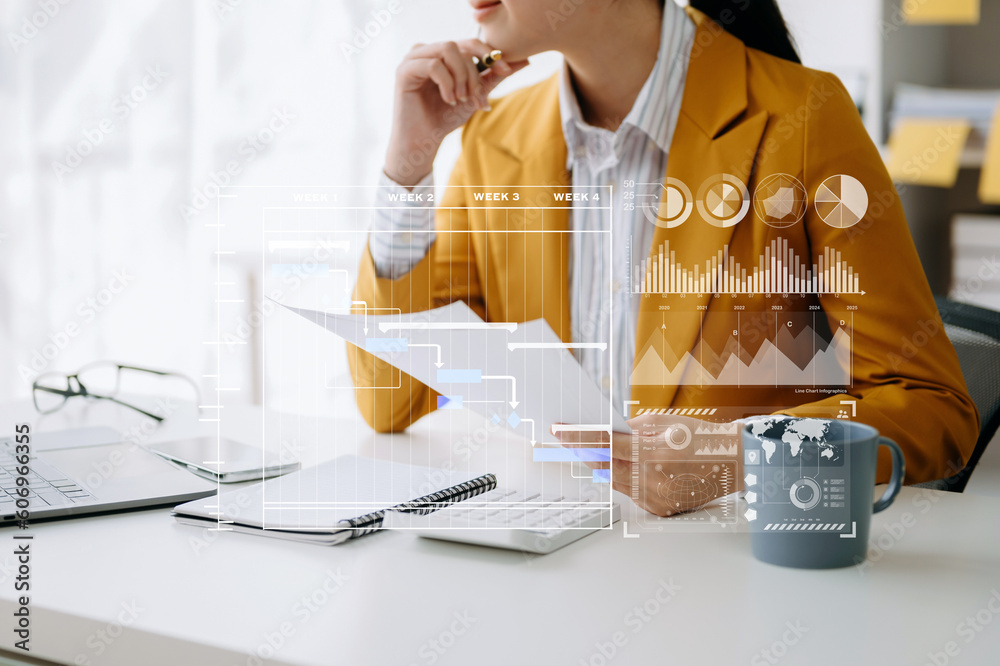 Project manager working and update tasks with milestones progress ...