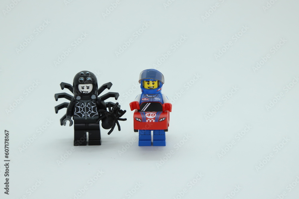 Lego character of a car racer. Racing driver doll. Formula 1 pilot ...