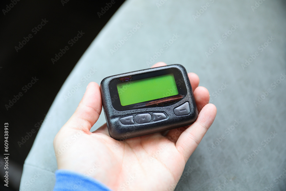Foto Beeper pager symbolizes communication, urgency, and efficiency in ...