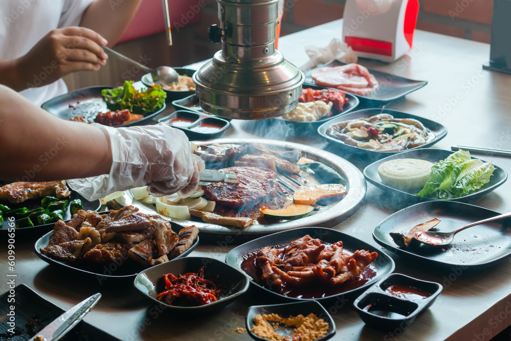 Korea BBQ style restaurant. Asian traditional pickle vegetable ...