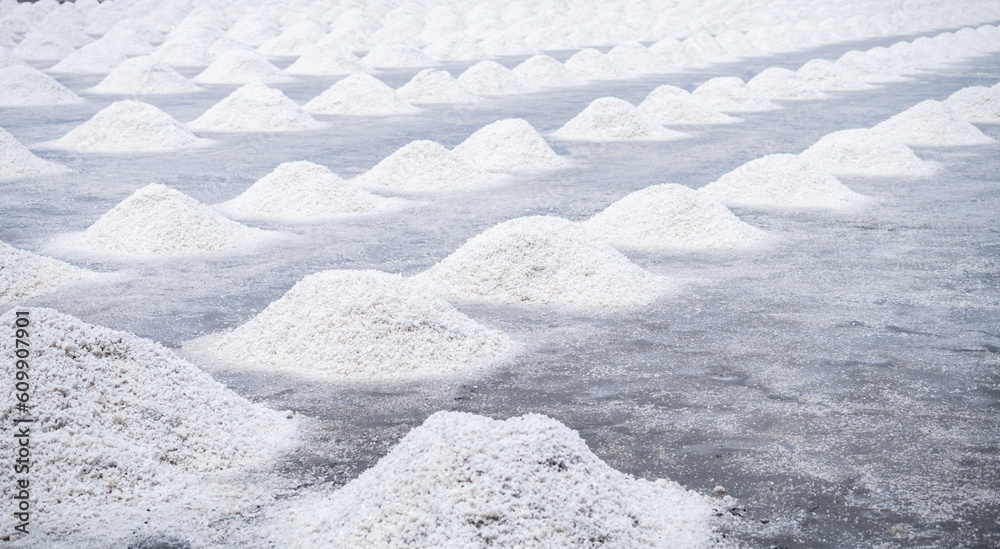 Sea salt farm. Pile of brine salt. Raw material of salt industrial ...