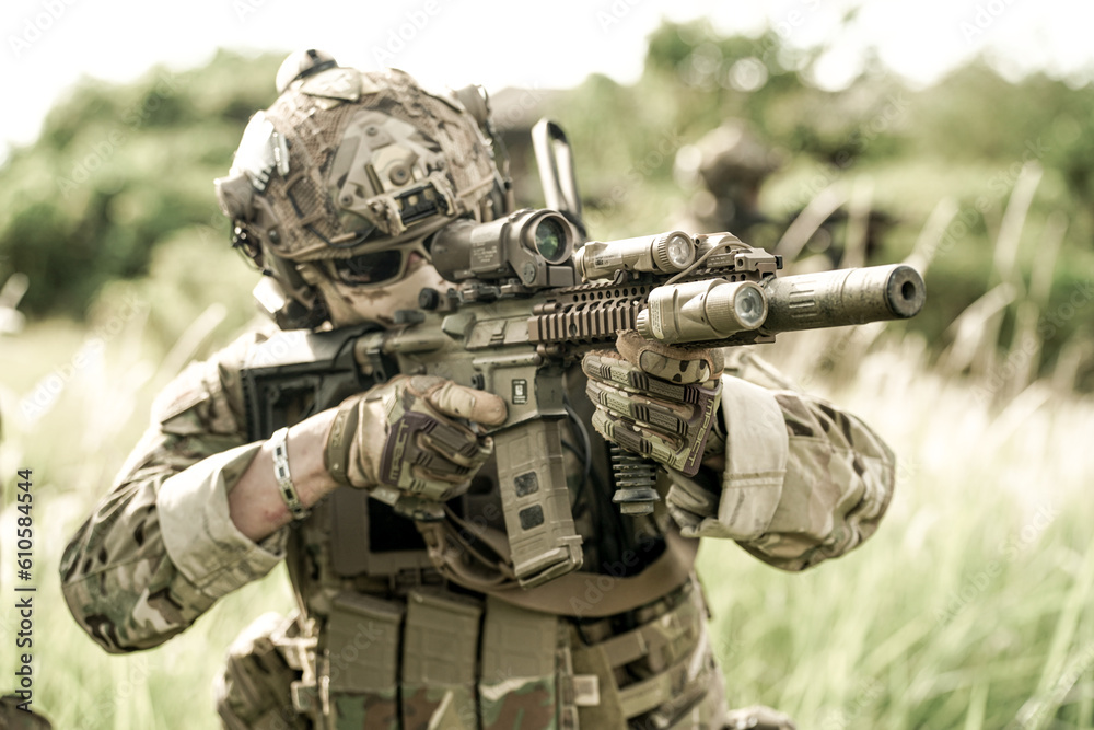 Infantry soldier shooting during military combat training.. Army elite ...