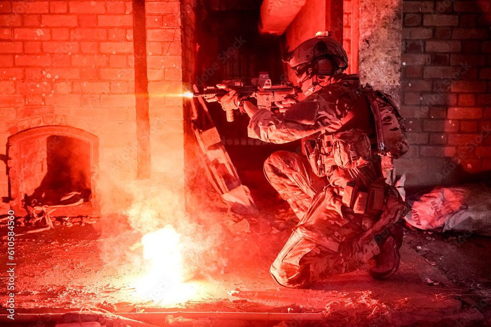 Infantry soldier shooting during military combat training.. Army elite ...
