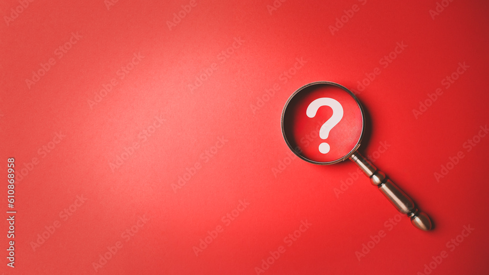 Magnifying glass and question mark icon symbol on red paper background ...