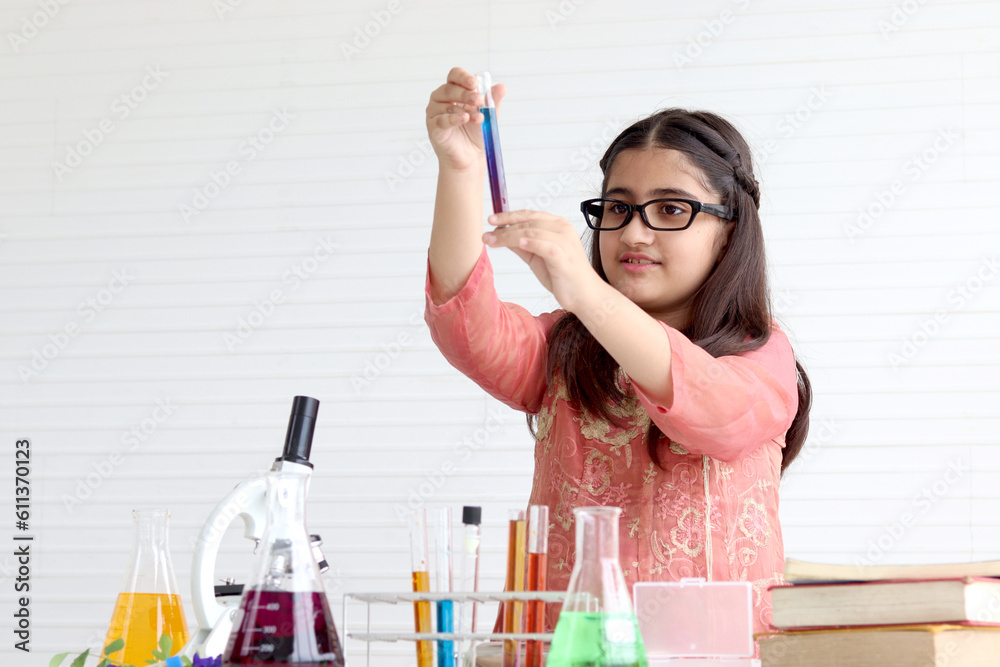 Foto de Stock Cute Indian school girl in India traditional dress ...