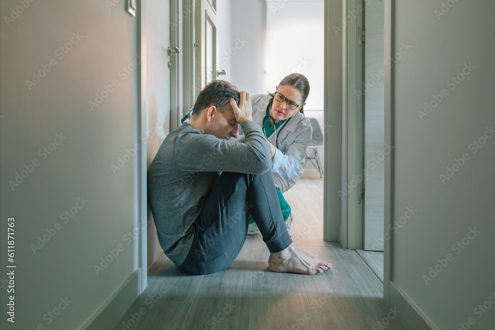 Female psychiatrist reassuring and helping with empathy to male patient ...