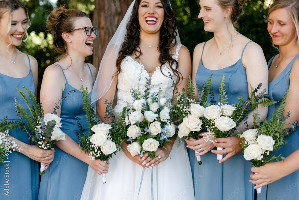 Laughing Bride and Bridesmaids at Wedding Stock Photo | Adobe Stock