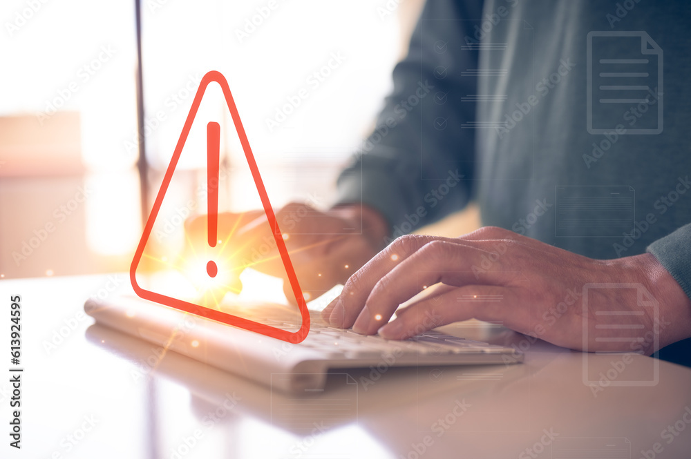 internet network security concept, man typing on keyboard with triangle ...