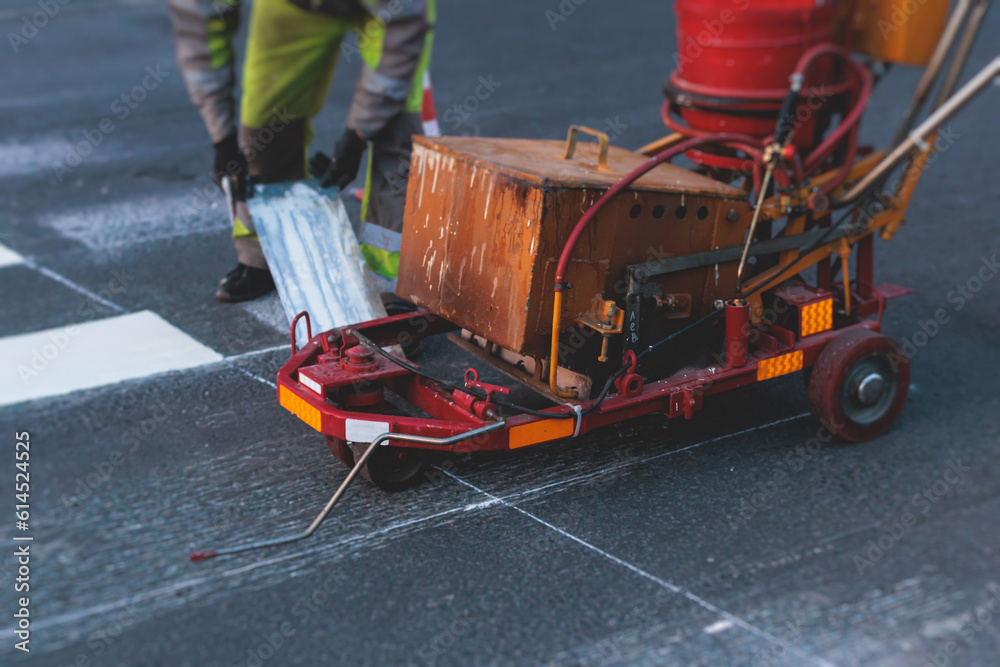 Process of making new road surface markings with a line striping ...