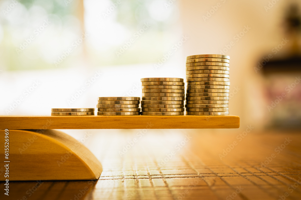 Coins stack with balance scale. Money management, financial plan, time ...