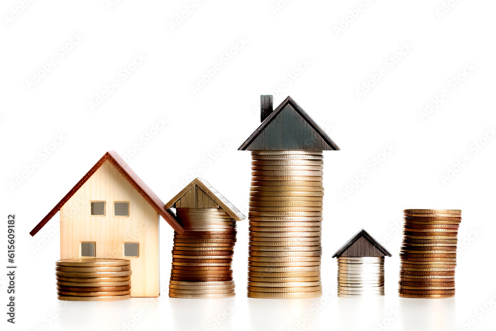 Histogram in the form of stacked coins and model houses. concept for ...
