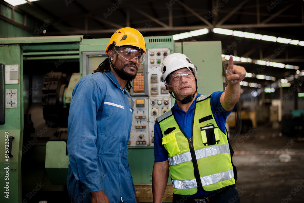 Engineer worker wearing safety uniform control operating and check ...