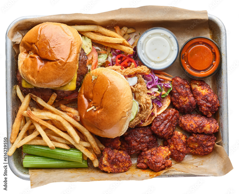 tray with burger, fried chicken sandwich, boneless wings, french fries ...