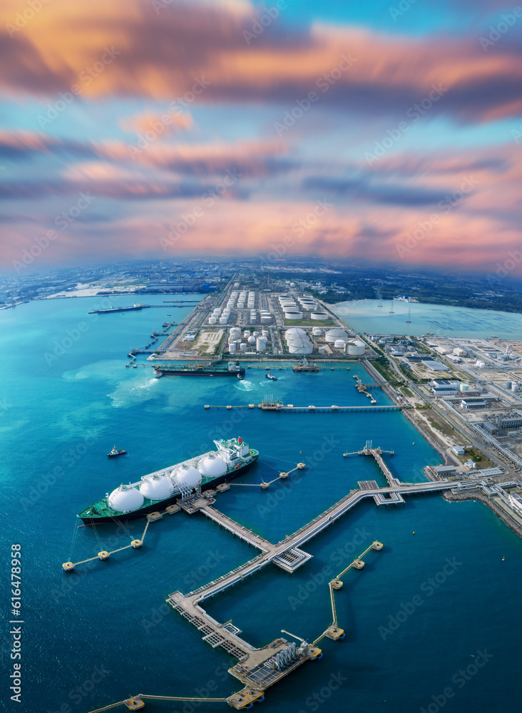 LNG (Liquified Natural Gas) tanker anchored in Gas terminal gas tanks ...