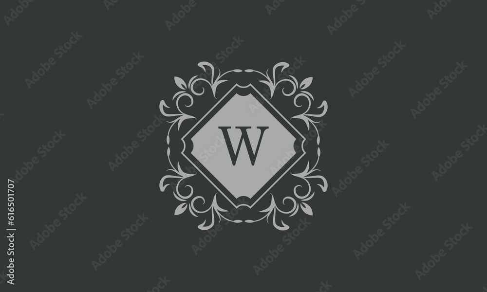 Floral frame with calligraphic elements, letter W. Template for signs ...