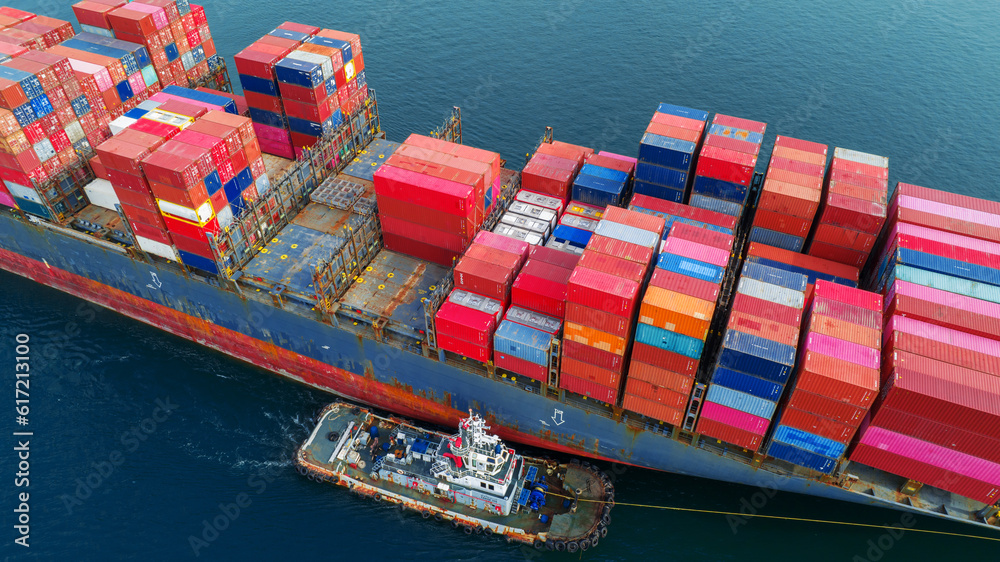 Aerial stern view Cargo Ship carrying container and running for export ...