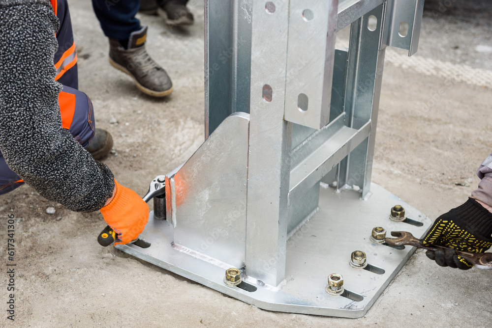 Bolts nuts screw washer in the concrete road surface. Bridge ...