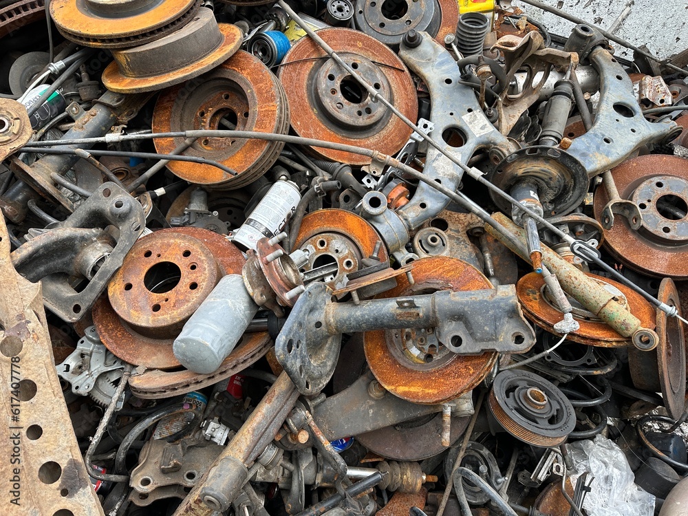 Junkyard for used auto parts. Car repair station. A pile of scrap metal ...