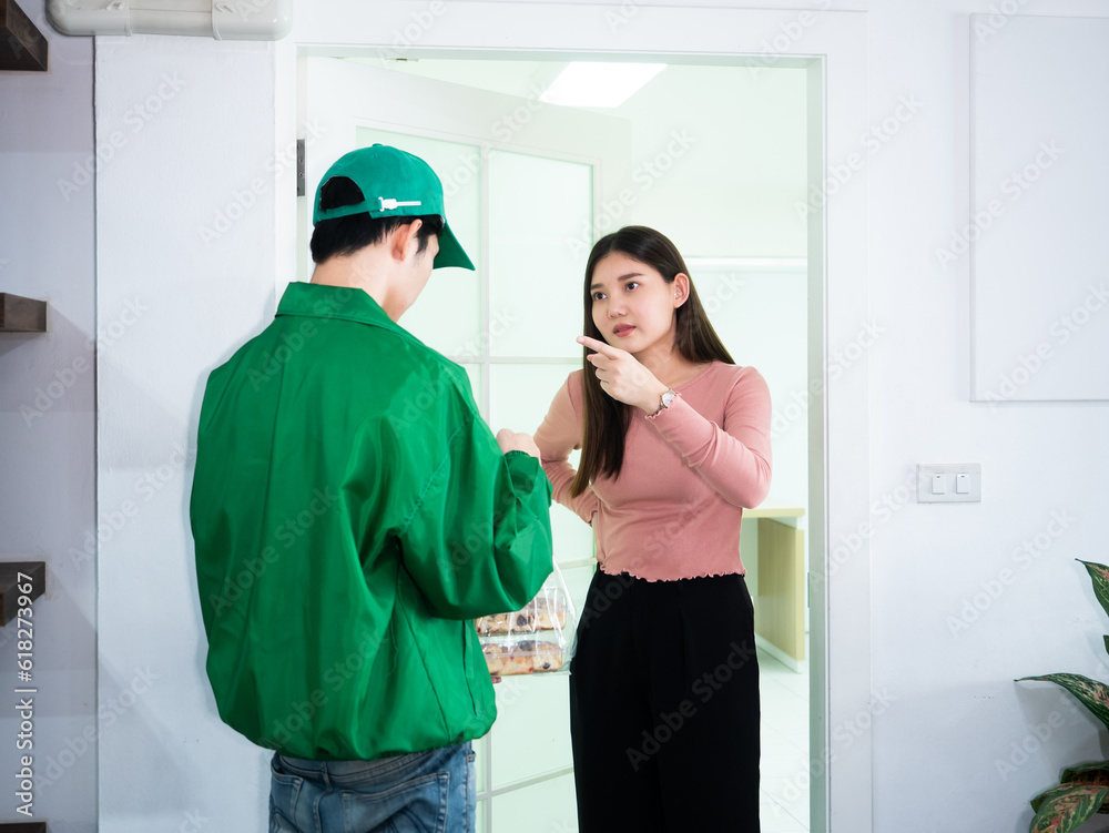 Asian client woman feedback service and complain while pointing finger ...