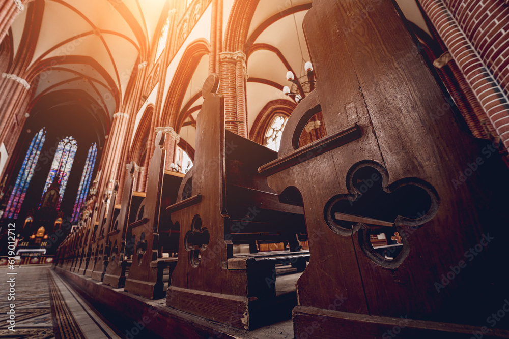 Rows of church benches at the old european catholic church. Stock Photo ...