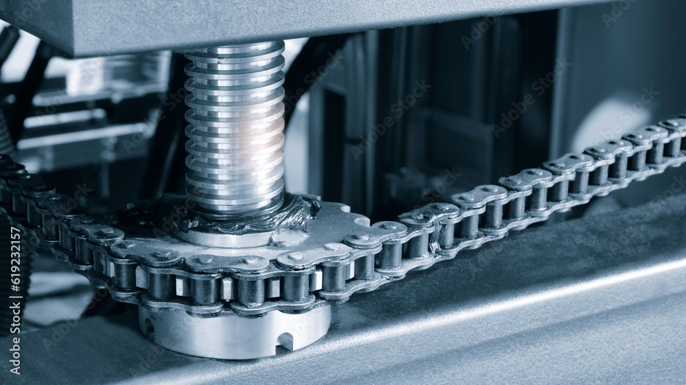 Gear chain drive shaft in conveyor belt is on production line. Timing ...