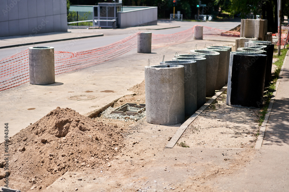 Laying concrete manholes and drain pipes for stormwater system ...