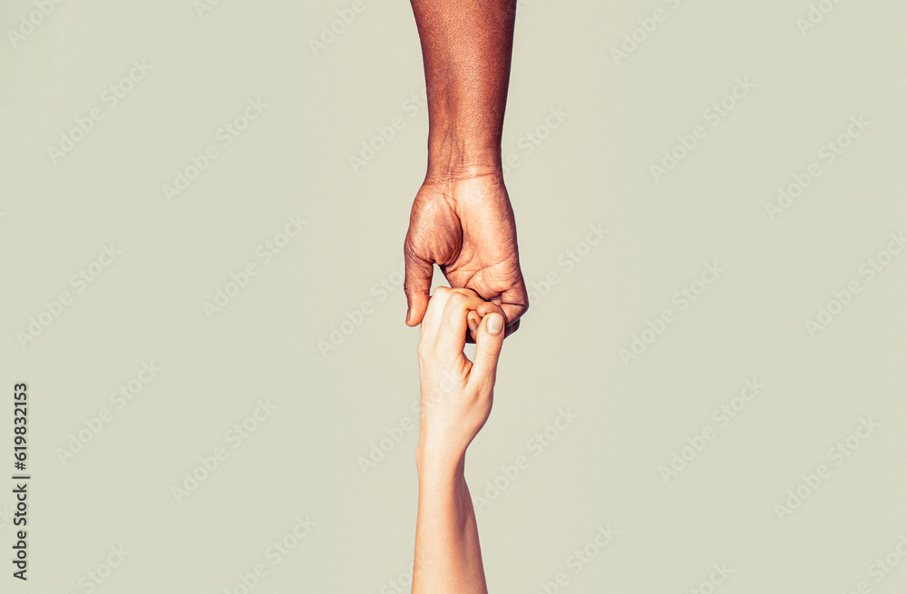 Helping hands, Rescue gesture. Black and white human hands. Giving a ...