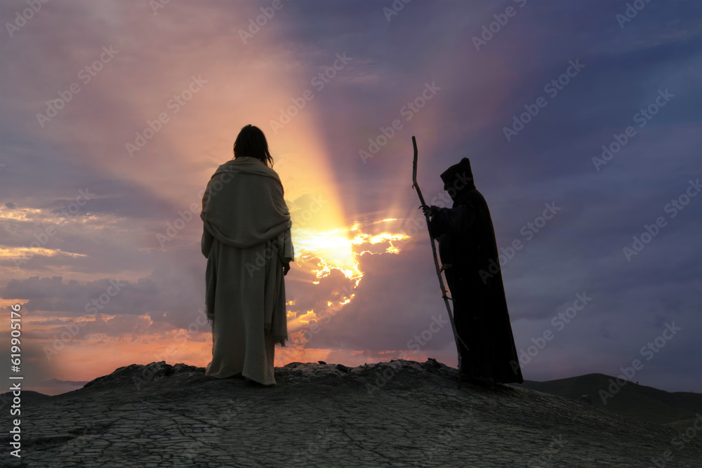 Jesus and Satan on a hill at spectacular sunset in the Wilderness of ...