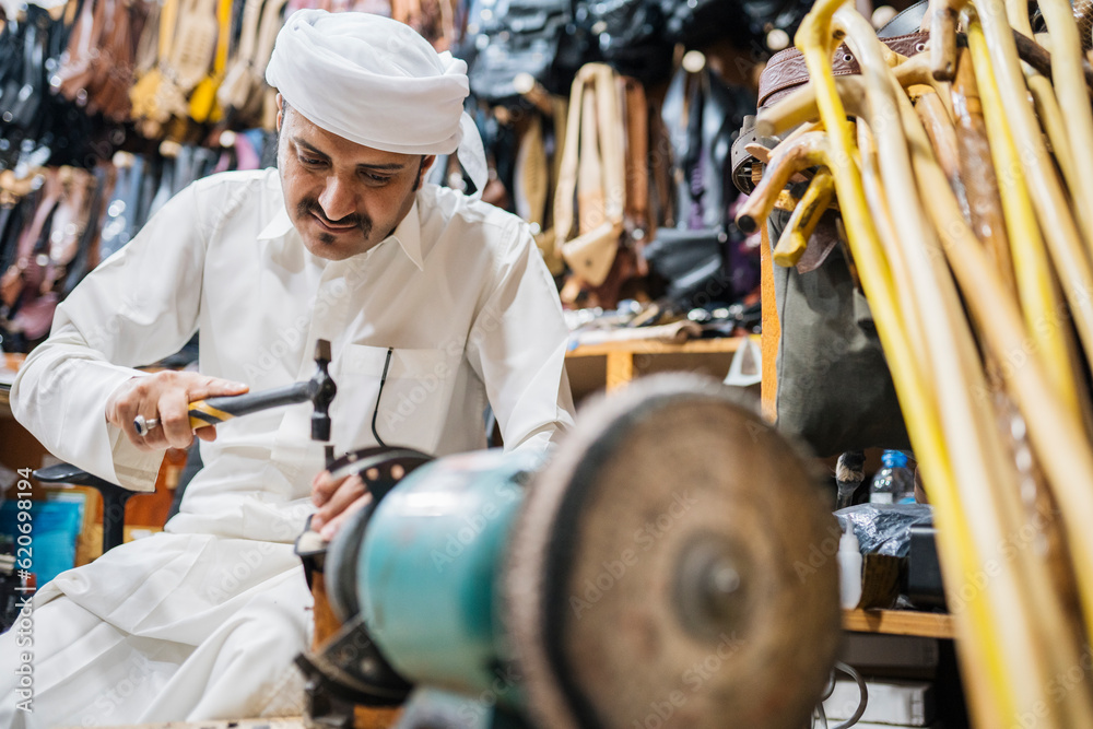Professional master with hammer making leather belt Stock Photo | Adobe ...