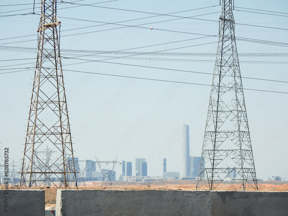 transmission towers, electricity pylon, a tall steel lattice structure ...
