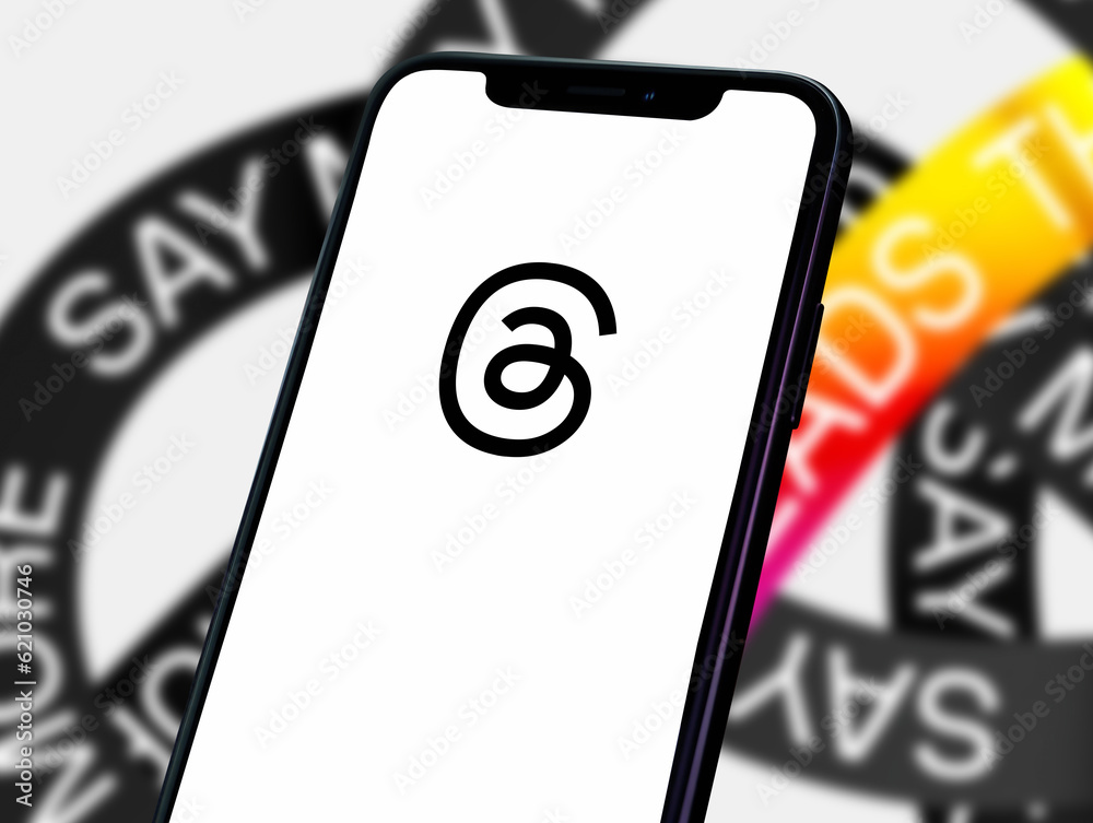 Threads logo is displayed on a smartphone screen. Threads is the new ...
