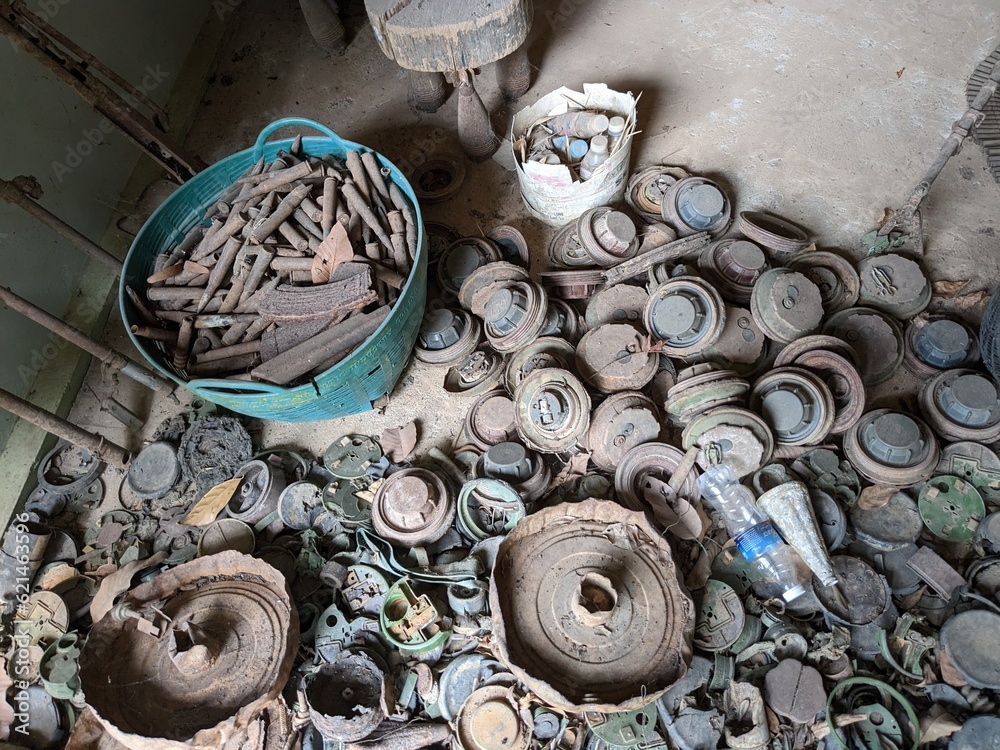 unexploded land mines and cluster bombs remains picked up all around ...