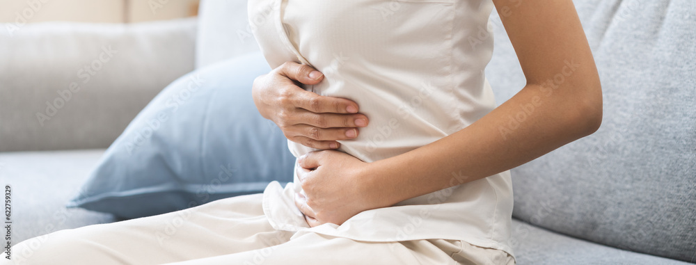 Flatulence ulcer, asian young woman, girl hands in belly, stomach pain ...